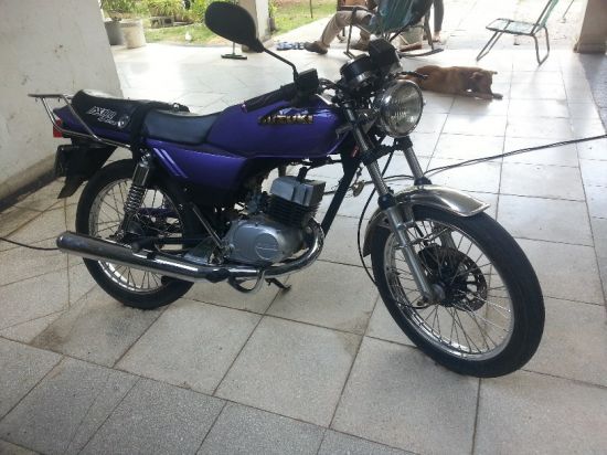 📢 Vendo suzuki ax 100 motor japonés buena opción